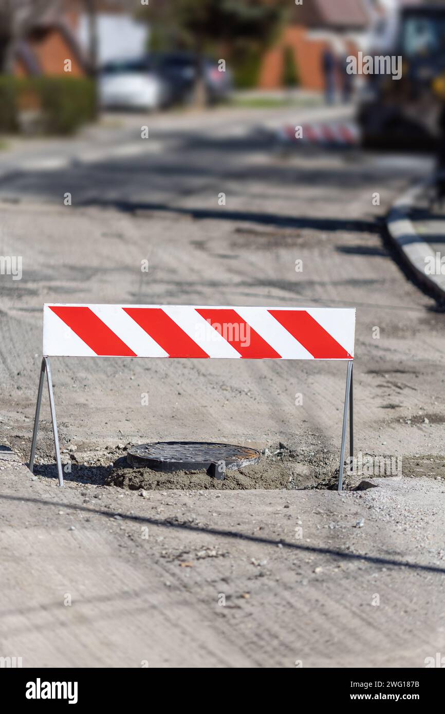 reparation and installation of road manhole Stock Photo - Alamy
