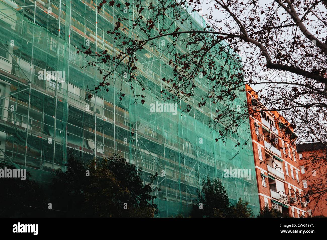 Reconstruction of facade of a historic apartment building on a city ...