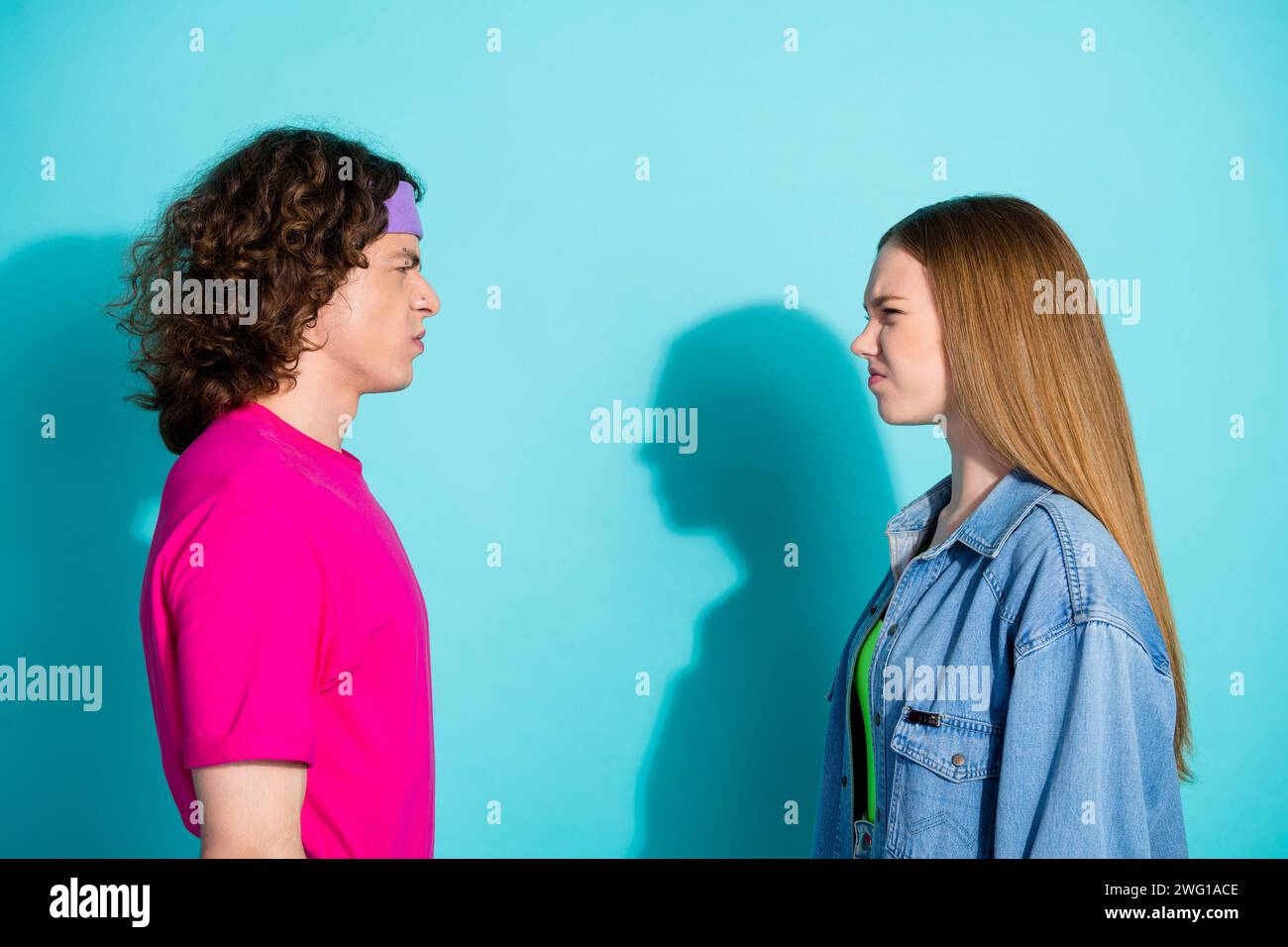 Side profile photo of furious couple teenage boyfriend looking at his ...