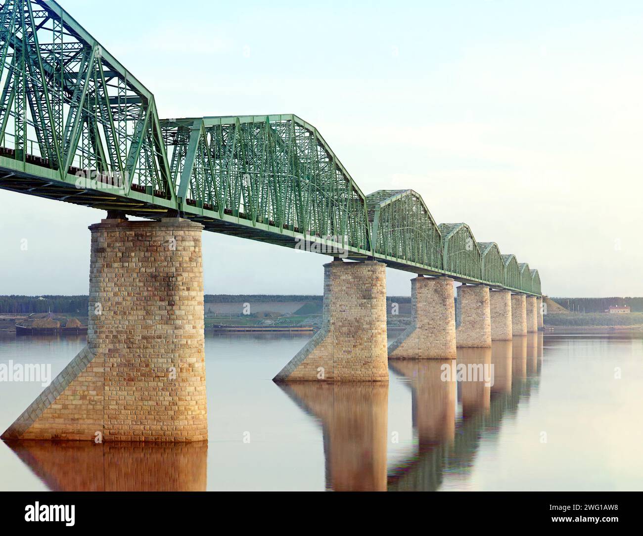 Trans-Siberian Railway metal truss bridge on stone piers, over the Kama ...