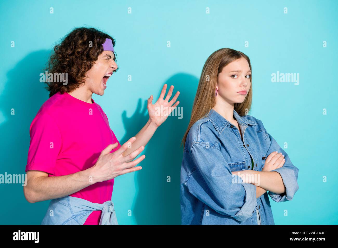Photo of stressed girl folded arms looking at her boyfriend crying ...