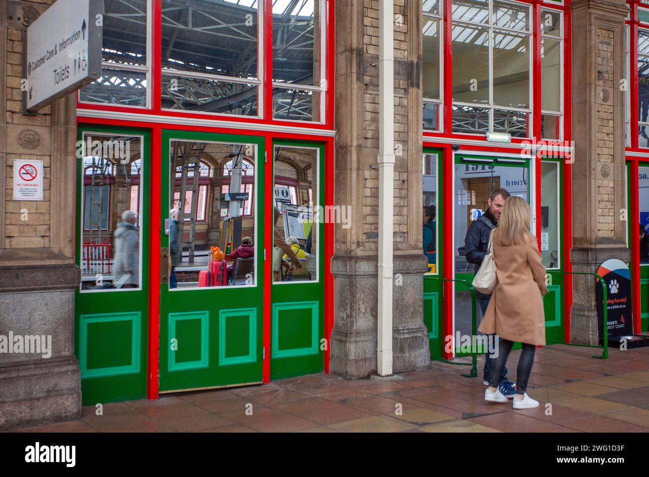 Distorted Glass passenger and train reflections. Refraction of light in ...