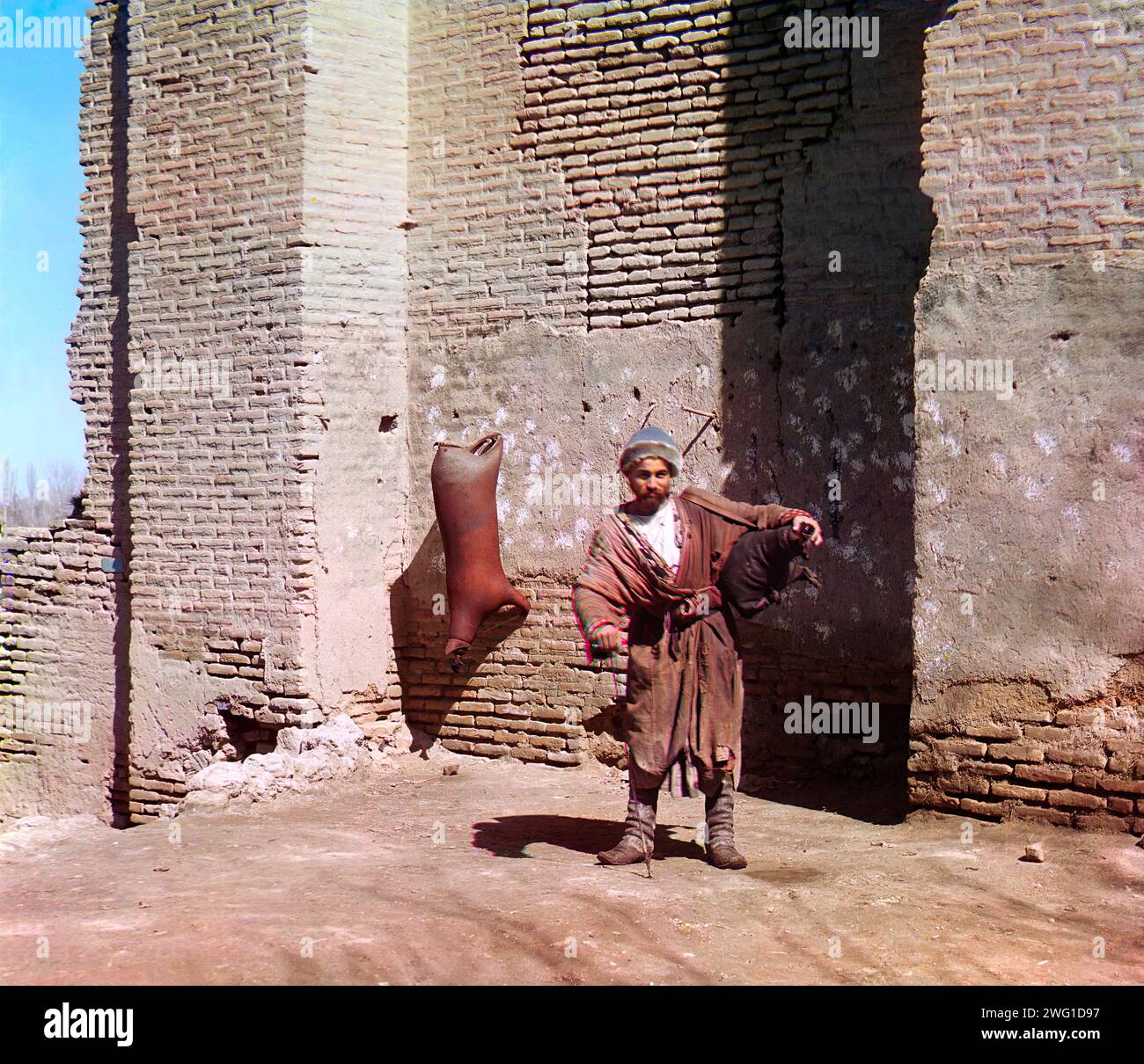 Water-carrier, Samarkand, between 1905 and 1915. Man with water ...