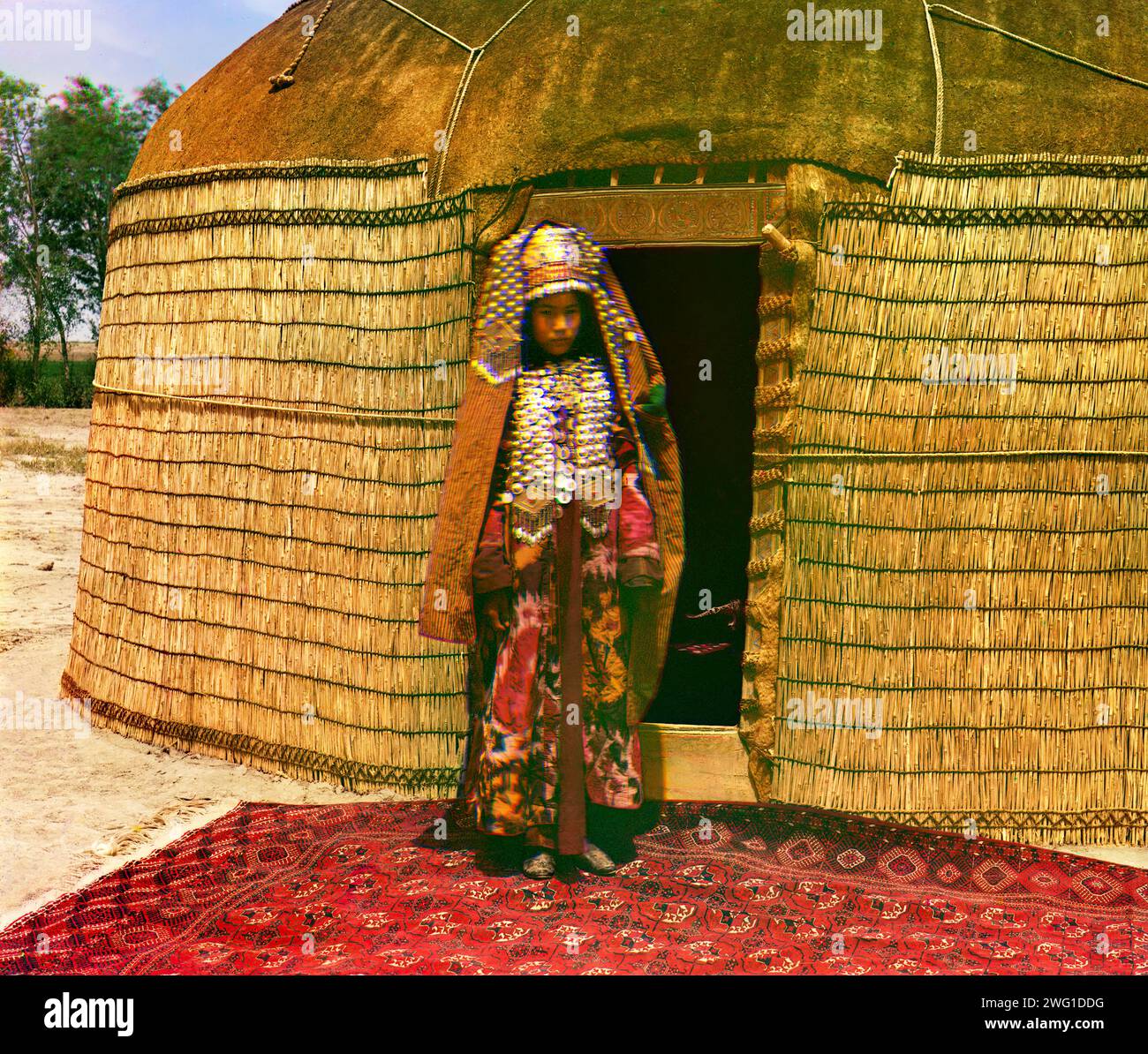 Full-length profile portrait of a woman, possibly Turkman or Kirgiz ...