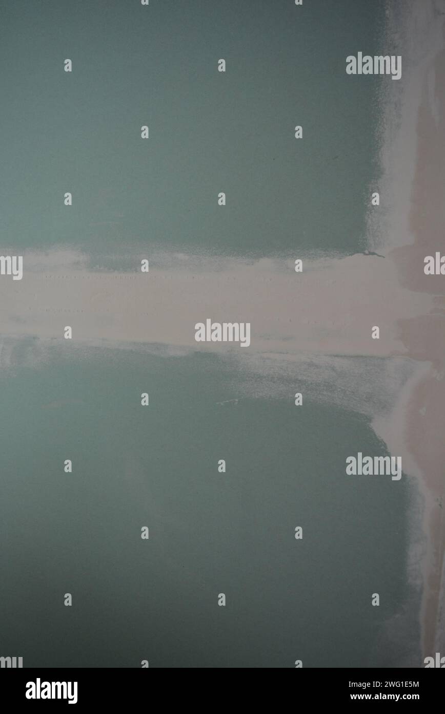 Building materials, repairs, over-the-top seams of green drywall sheets ...