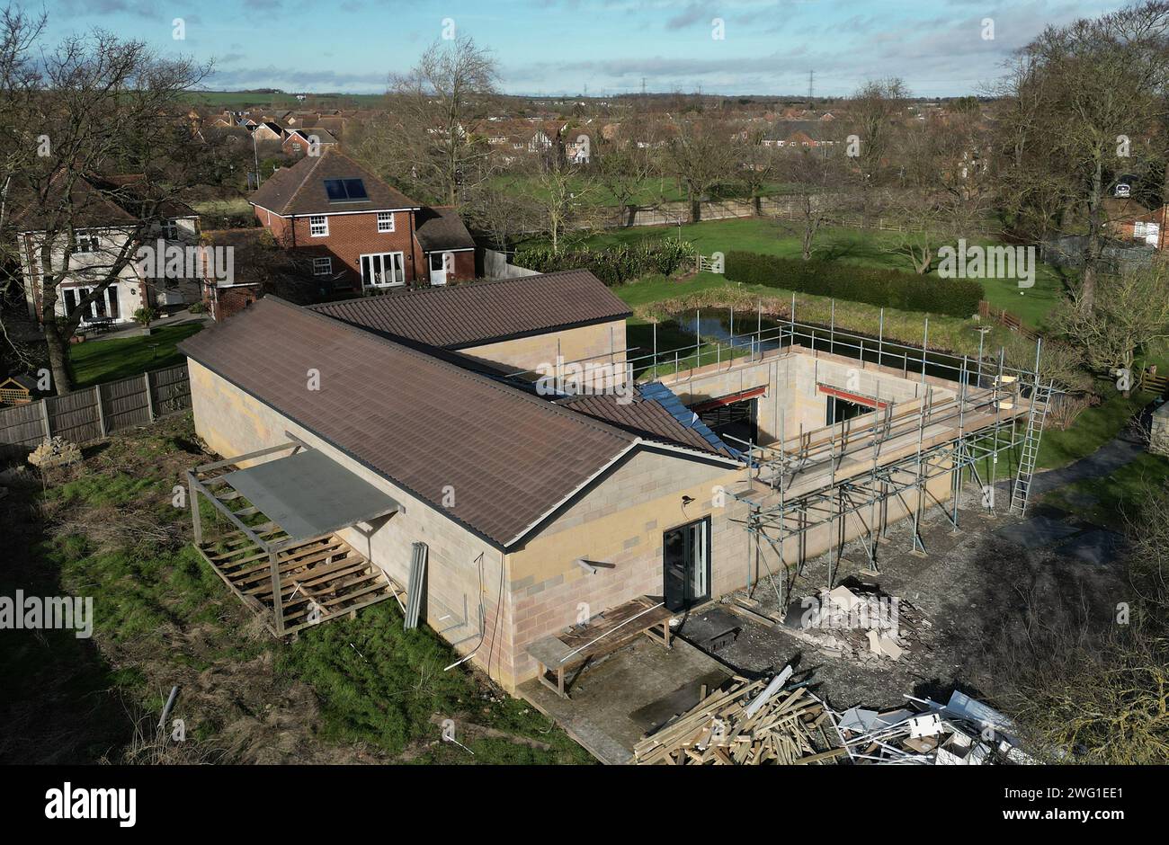 Work continues to demolish an unauthorised spa pool block at the home ...