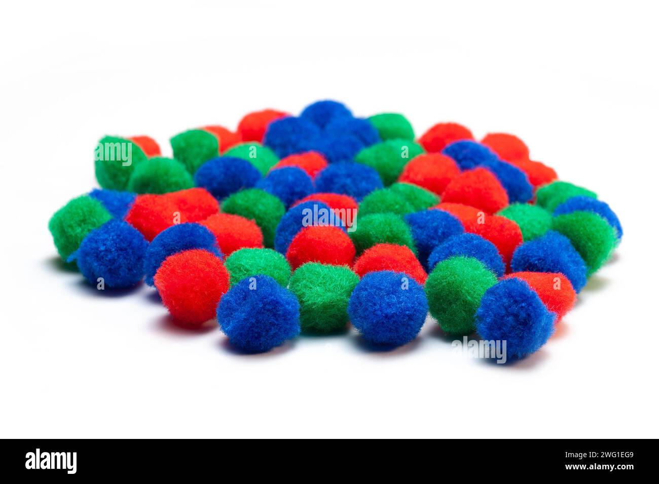 small fluffy balls isolated on white background Stock Photo - Alamy