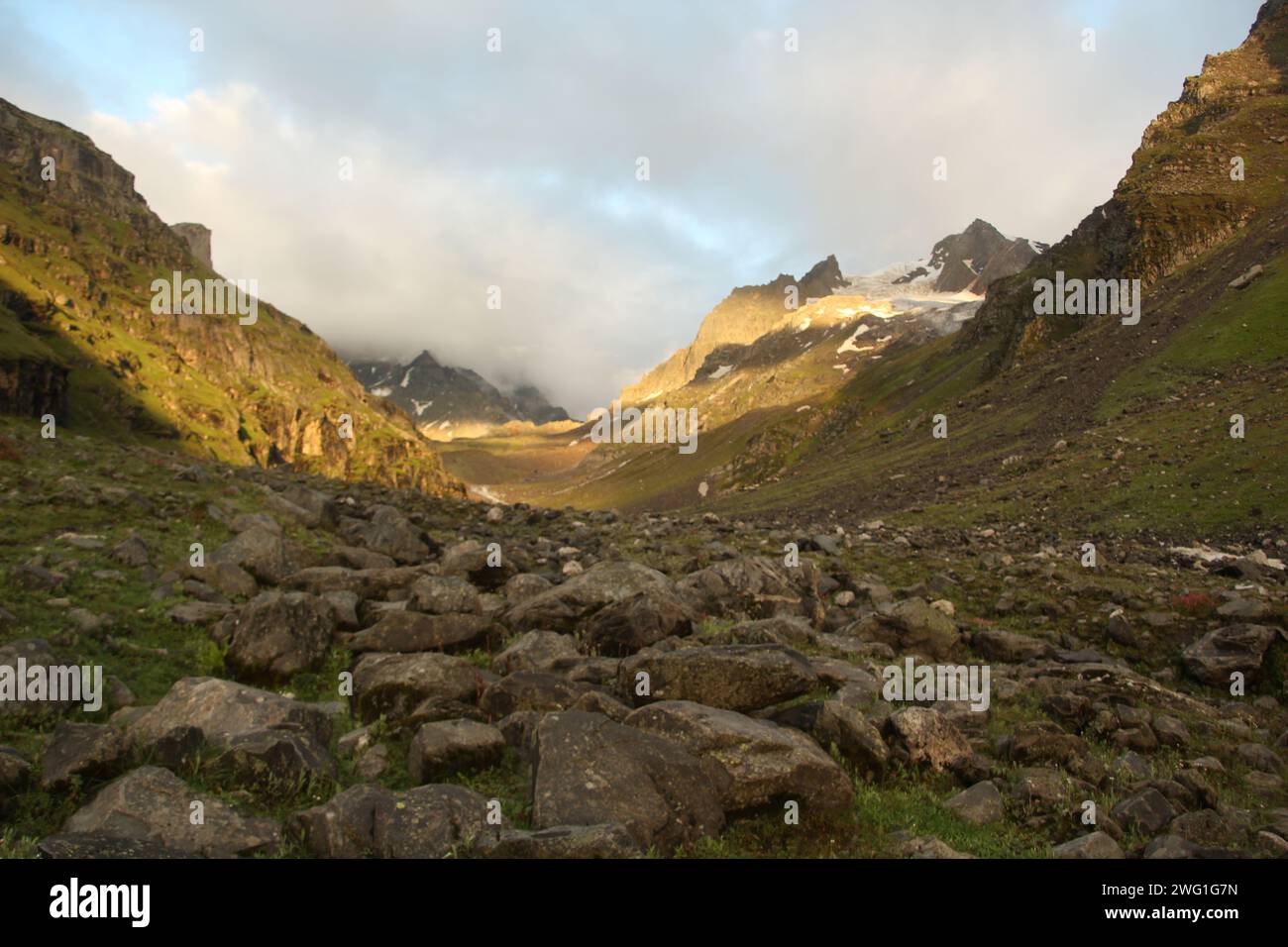 The rock walls rise dramatically from the ground, reaching impressive ...