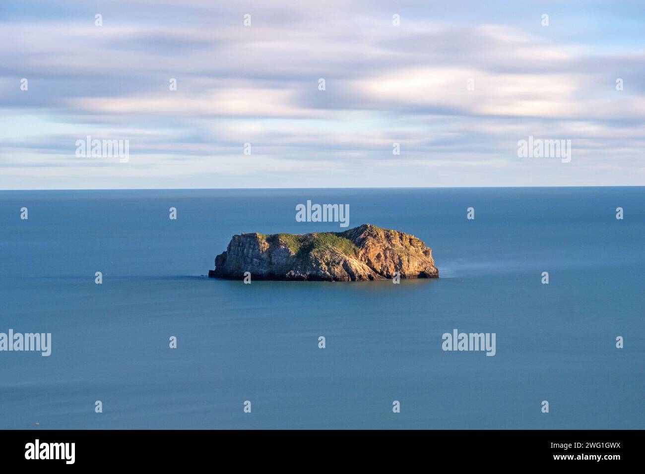 A long exposure photo of Orestone Rock in the sea at Torbay, Torquay ...