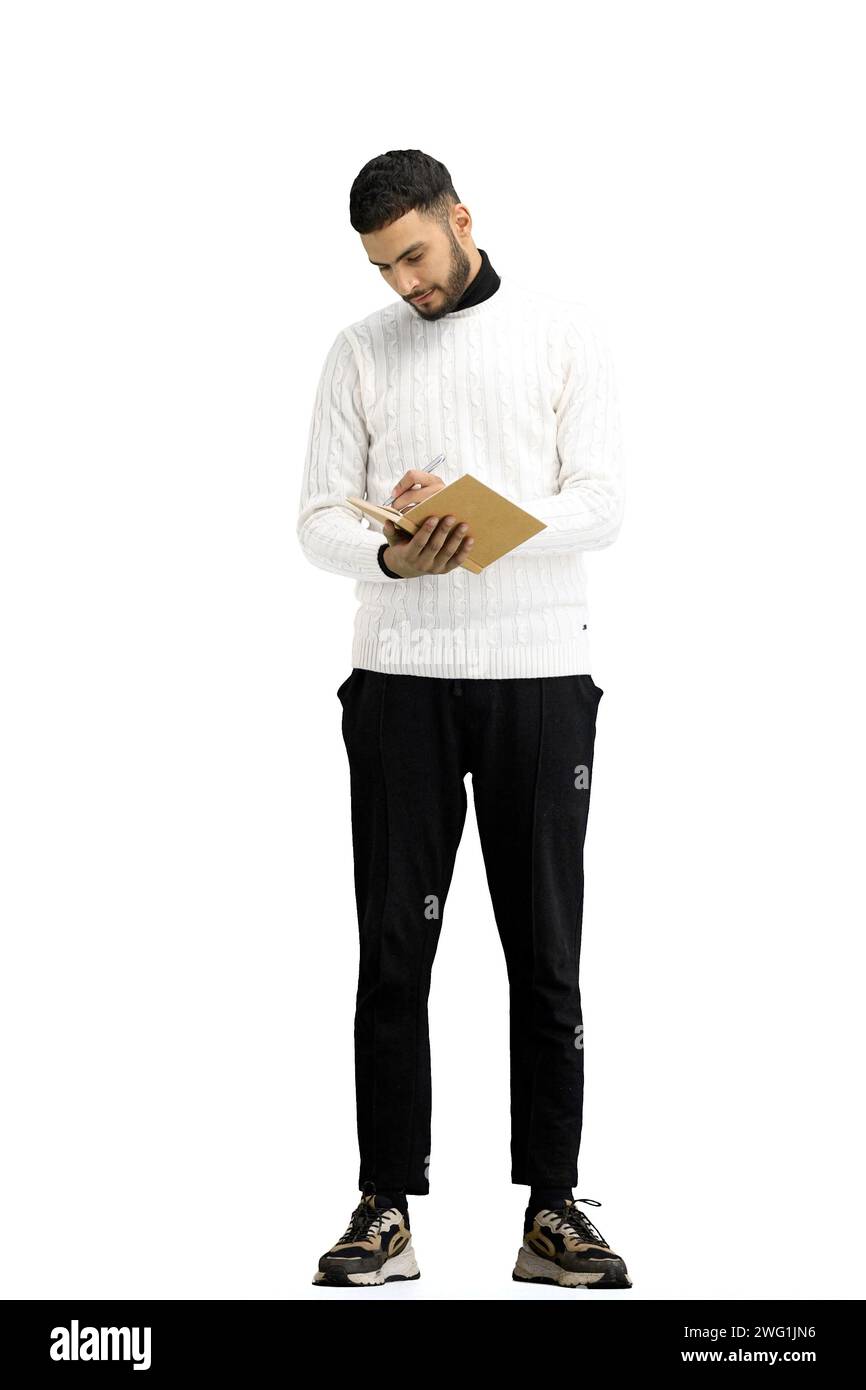 A man, full-length, on a white background, writes Stock Photo - Alamy
