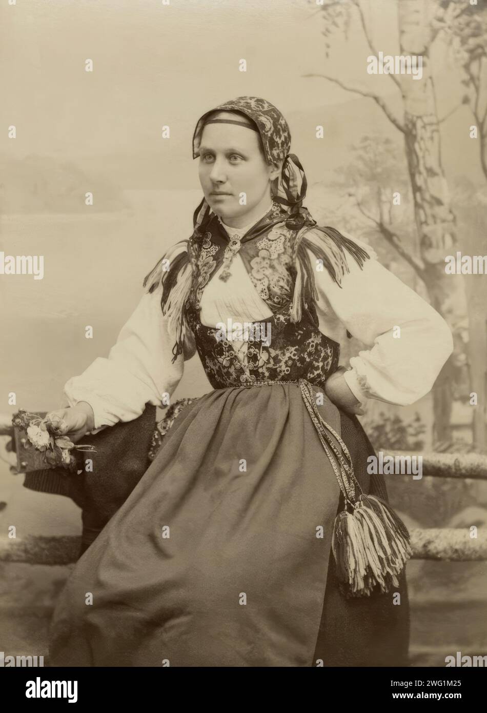 A young woman poses in a folk costume, 1890-1920 Stock Photo - Alamy