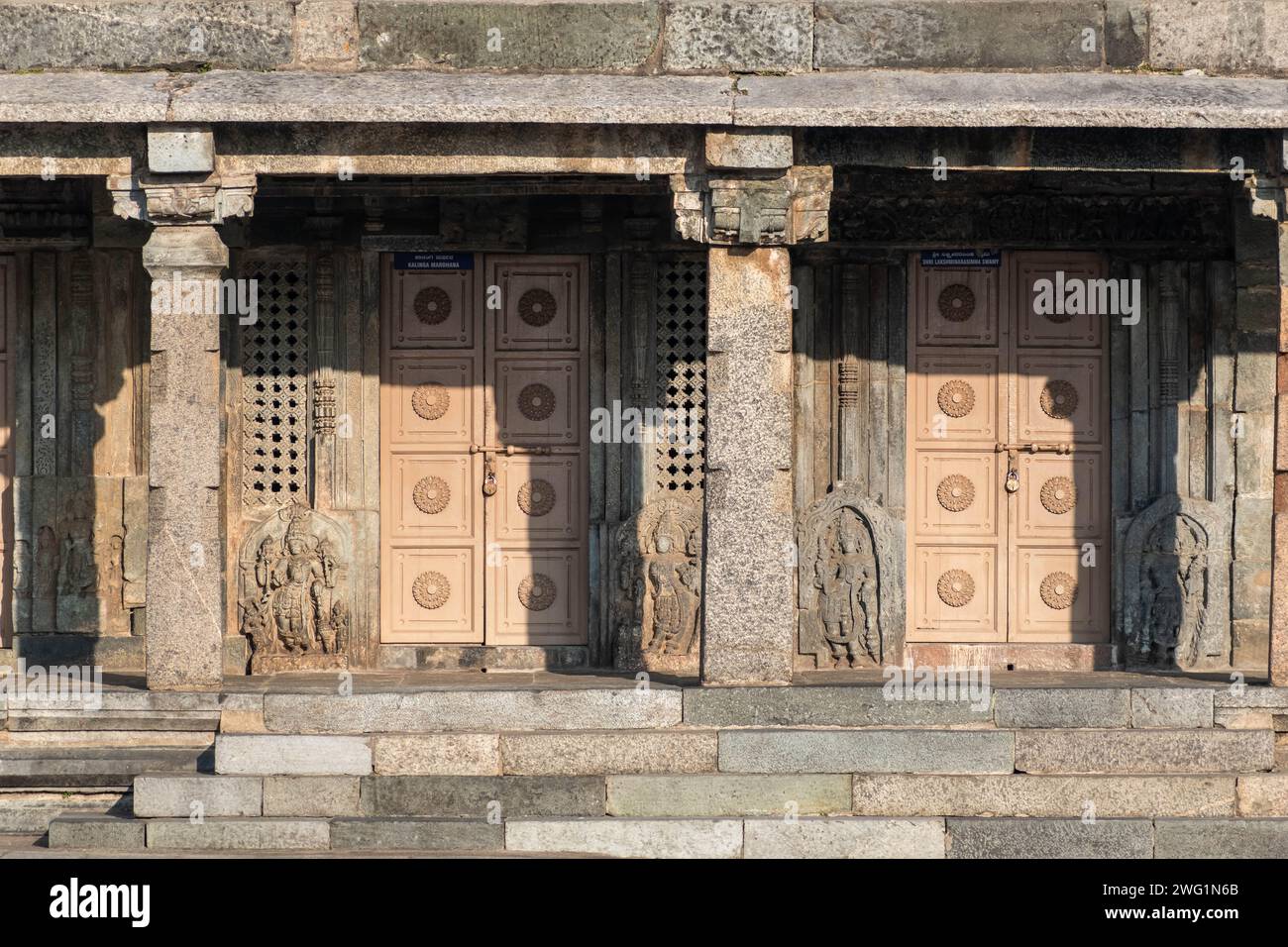 Wooden doors and ornate stone carvings at the ancient Chennakeshava ...