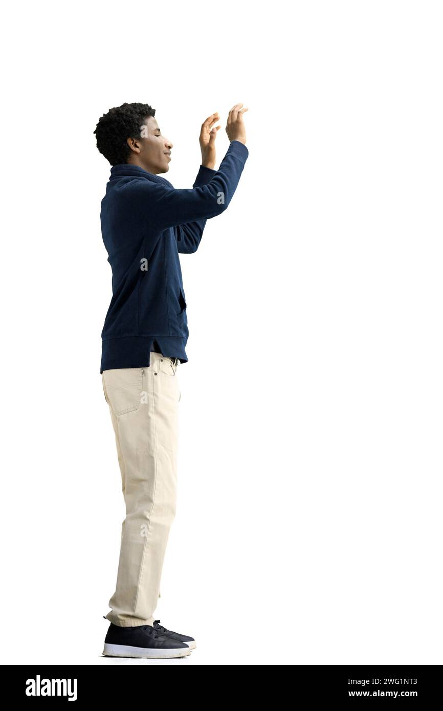 A man, full-length, on a white background, waving his arms Stock Photo ...