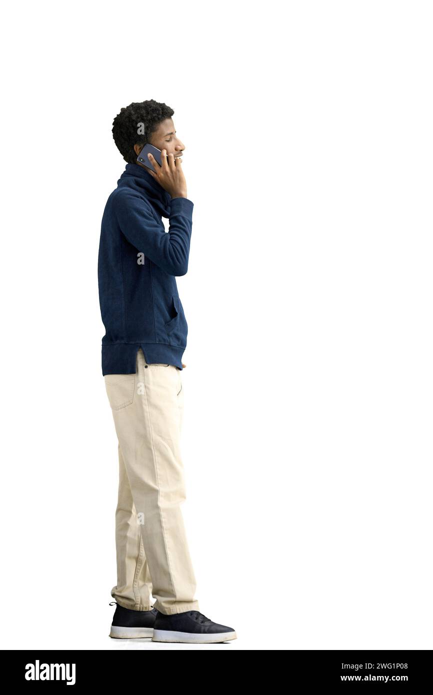 A man, full-length, on a white background, talking on the phone Stock ...