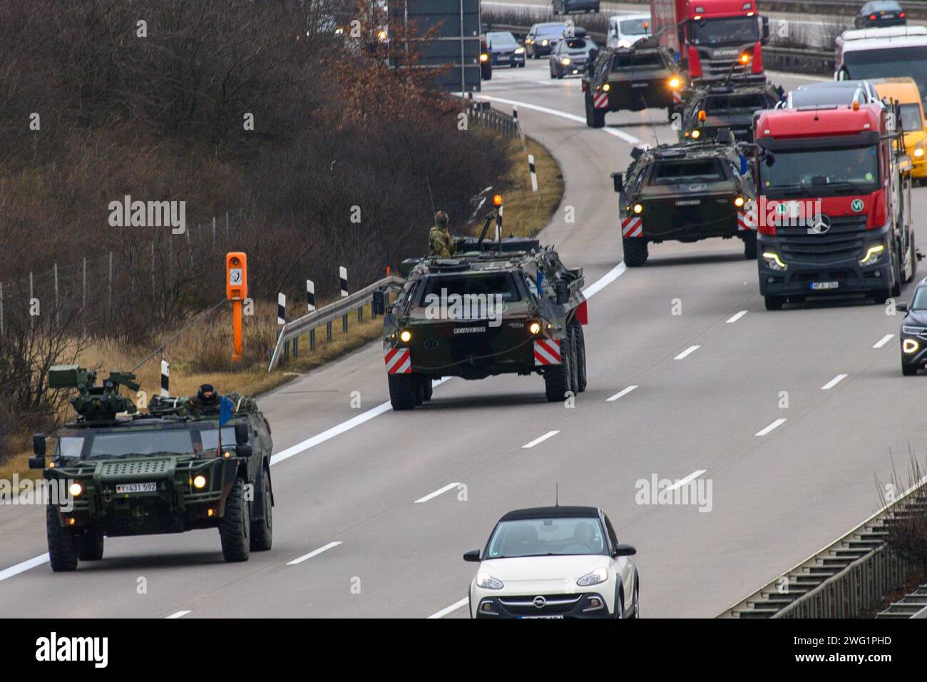 Ziesar, Germany. 02nd Feb, 2024. Bundeswehr vehicles roll along the A2 ...