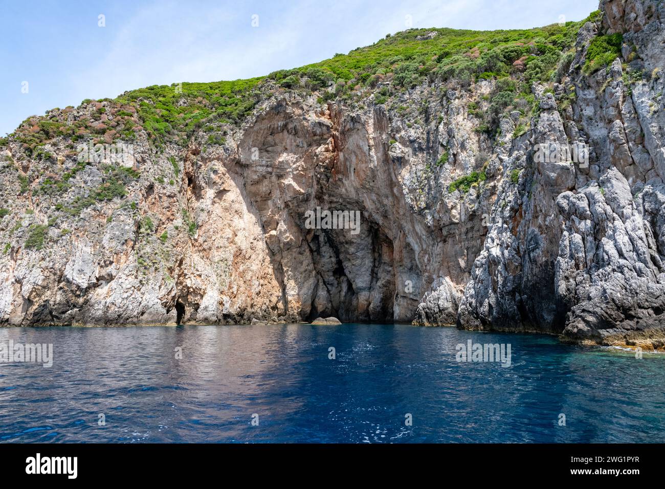 Cave in seaside cliffs hi-res stock photography and images - Alamy