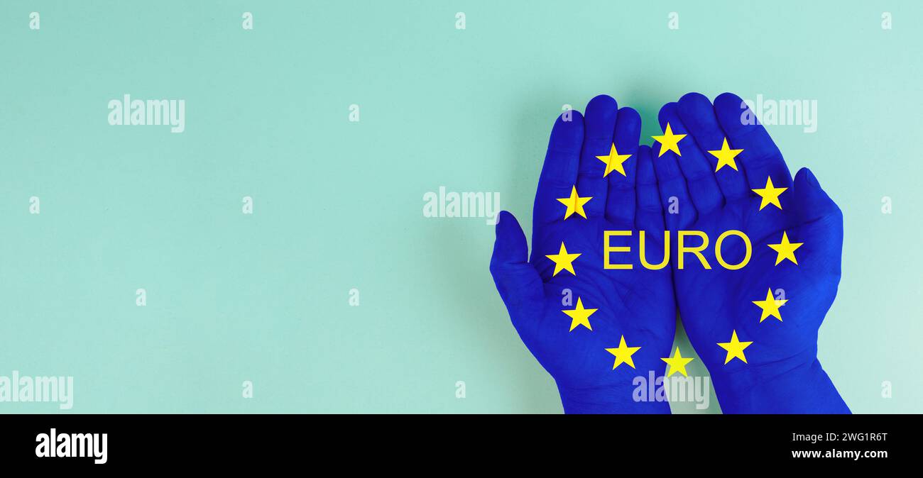 Hand with EU flag, european union, cooperation between the countries of ...