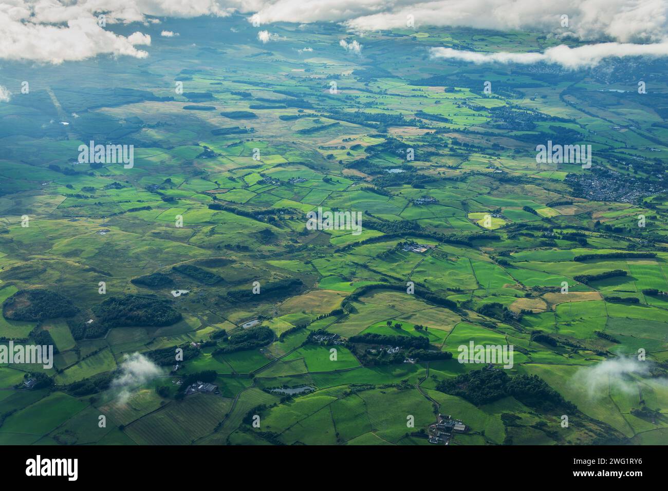 Aerial view of green fields in the scottish countryside near Glasgow ...