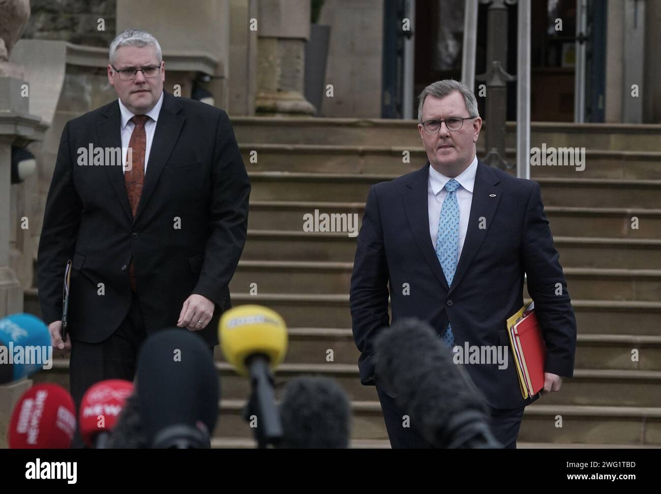 DUP leader Sir Jeffrey Donaldson (right) and deputy leader of the DUP Gavin Robinson, speak to ...