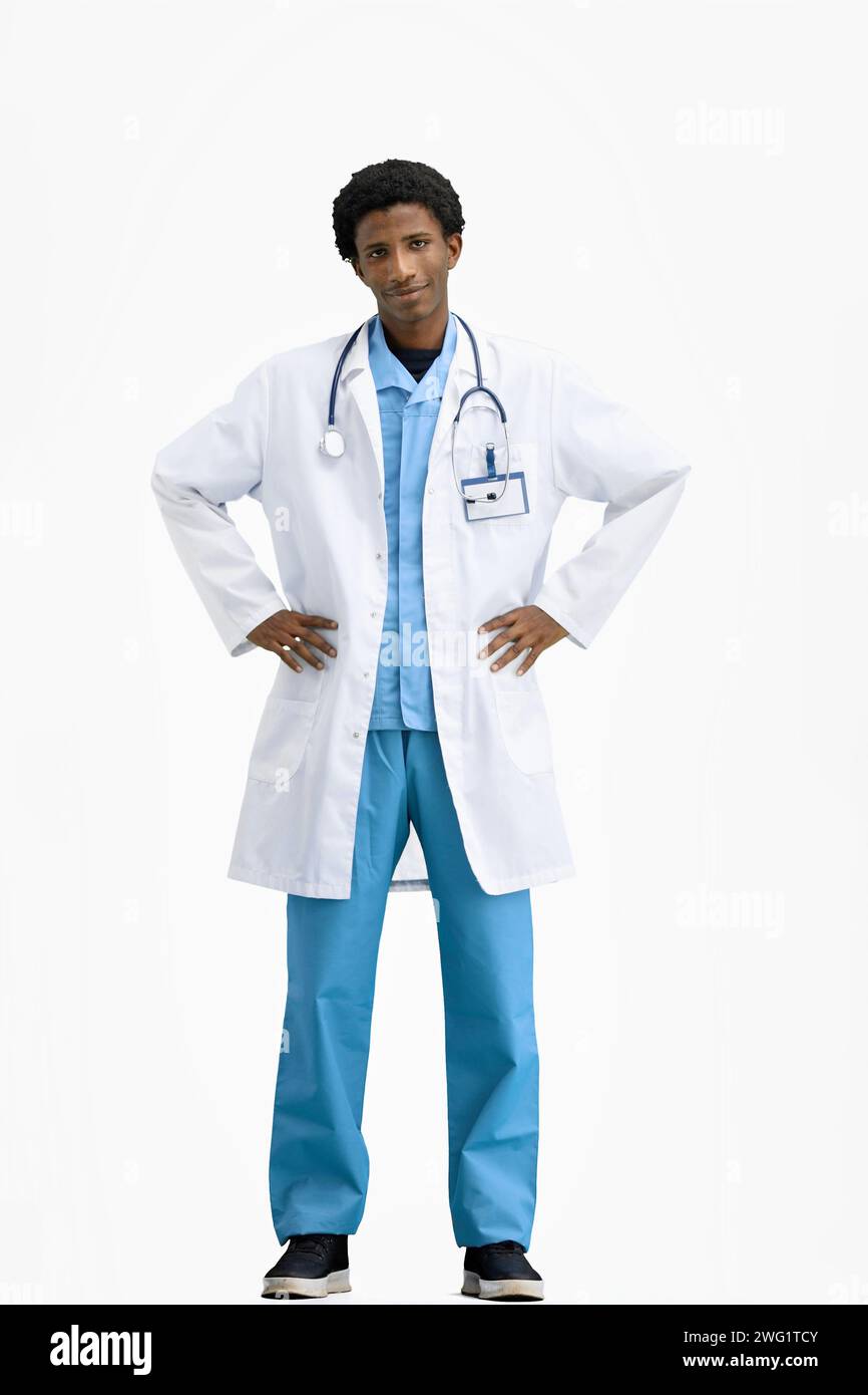 Doctor, full-length, on a white background, hands on hips Stock Photo ...
