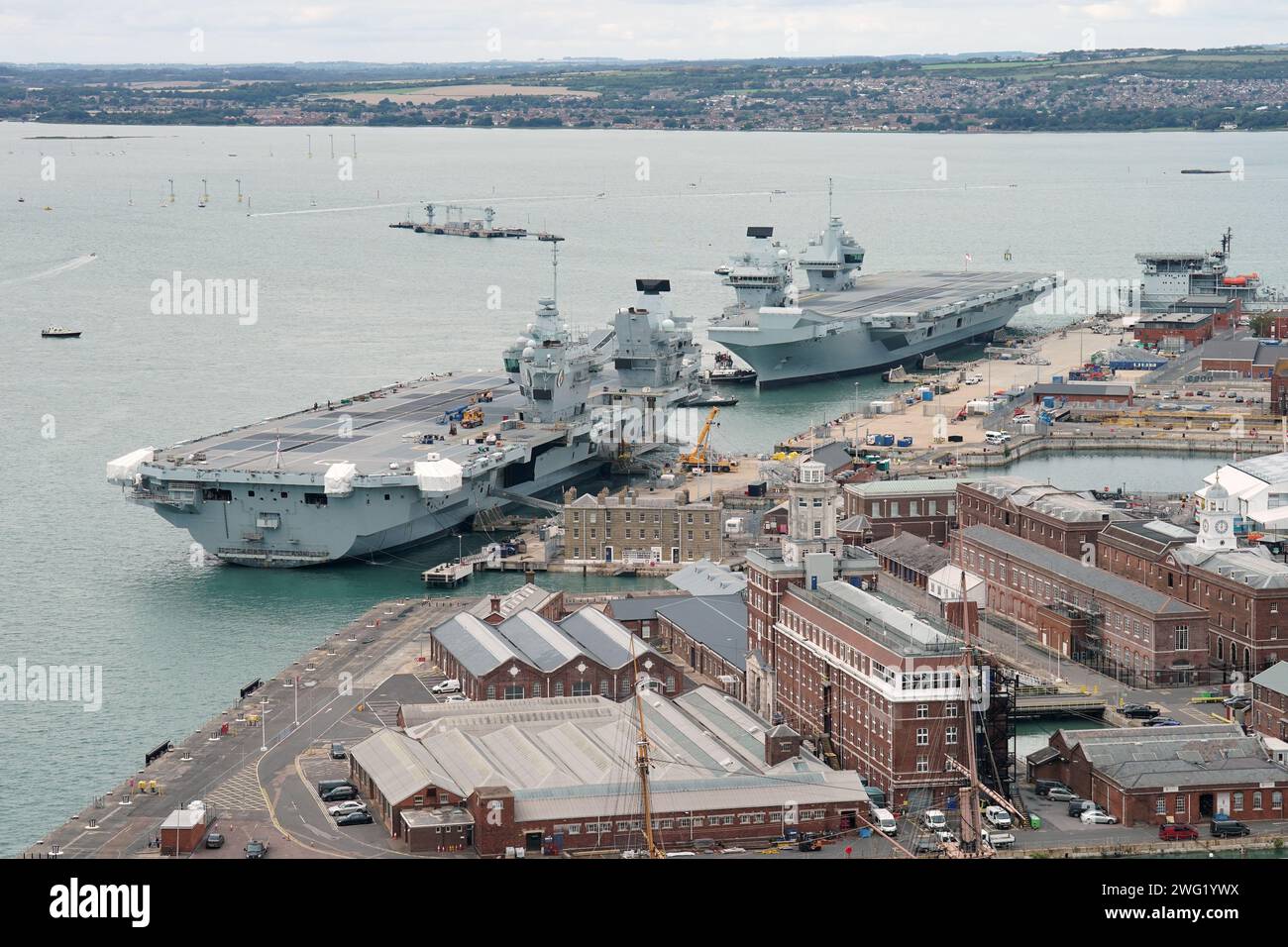 File photo dated 04/08/23 of aircraft carrier HMS Prince of Wales (top ...