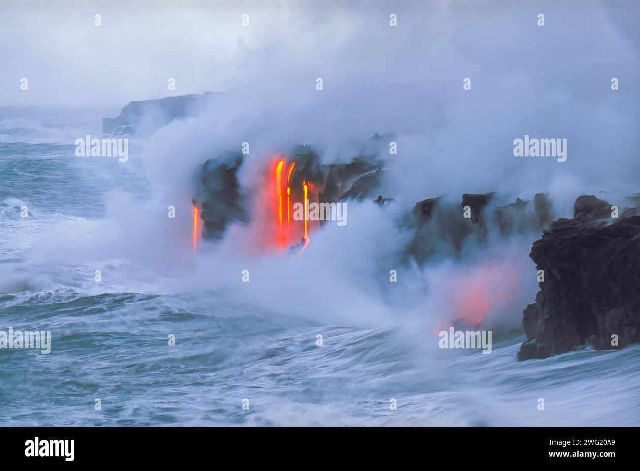 Molten, glowing lava flowing into the ocean. Kīlauea volcano, Big ...