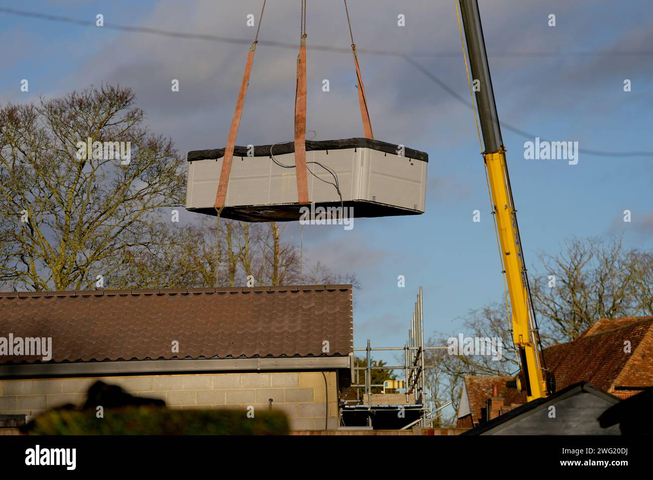 Work continues to demolish an unauthorised spa pool block at the home ...