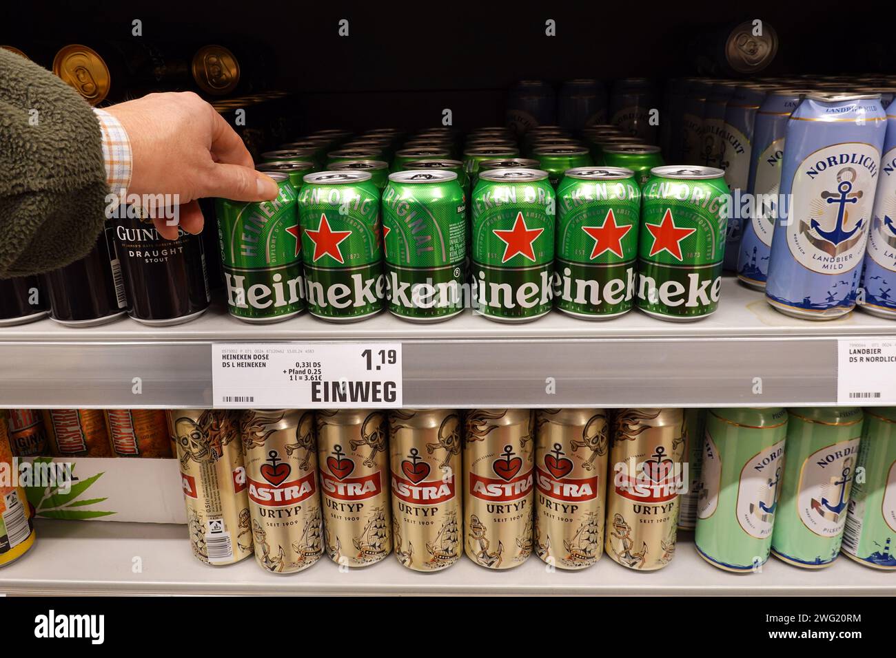 Heineken beer cans in a grocery Stock Photo - Alamy