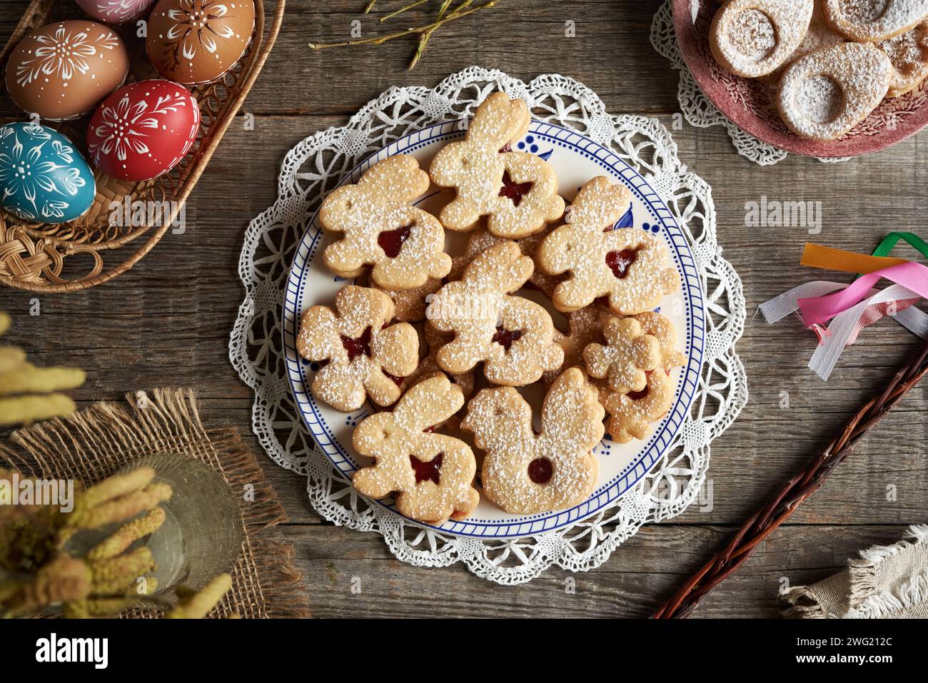 Homemade Linzer cookies in the shape of bunnies, chicken and four leaf ...