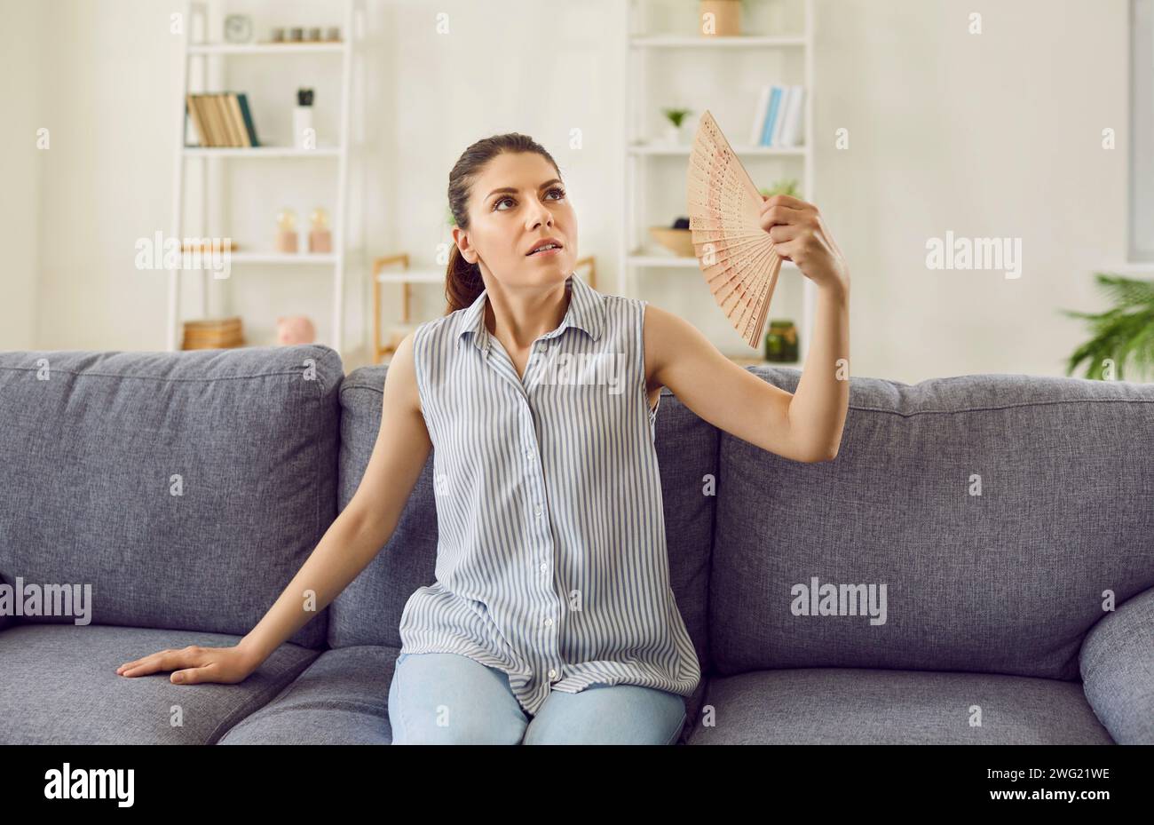 Stressed woman suffering heatstroke hi-res stock photography and images ...