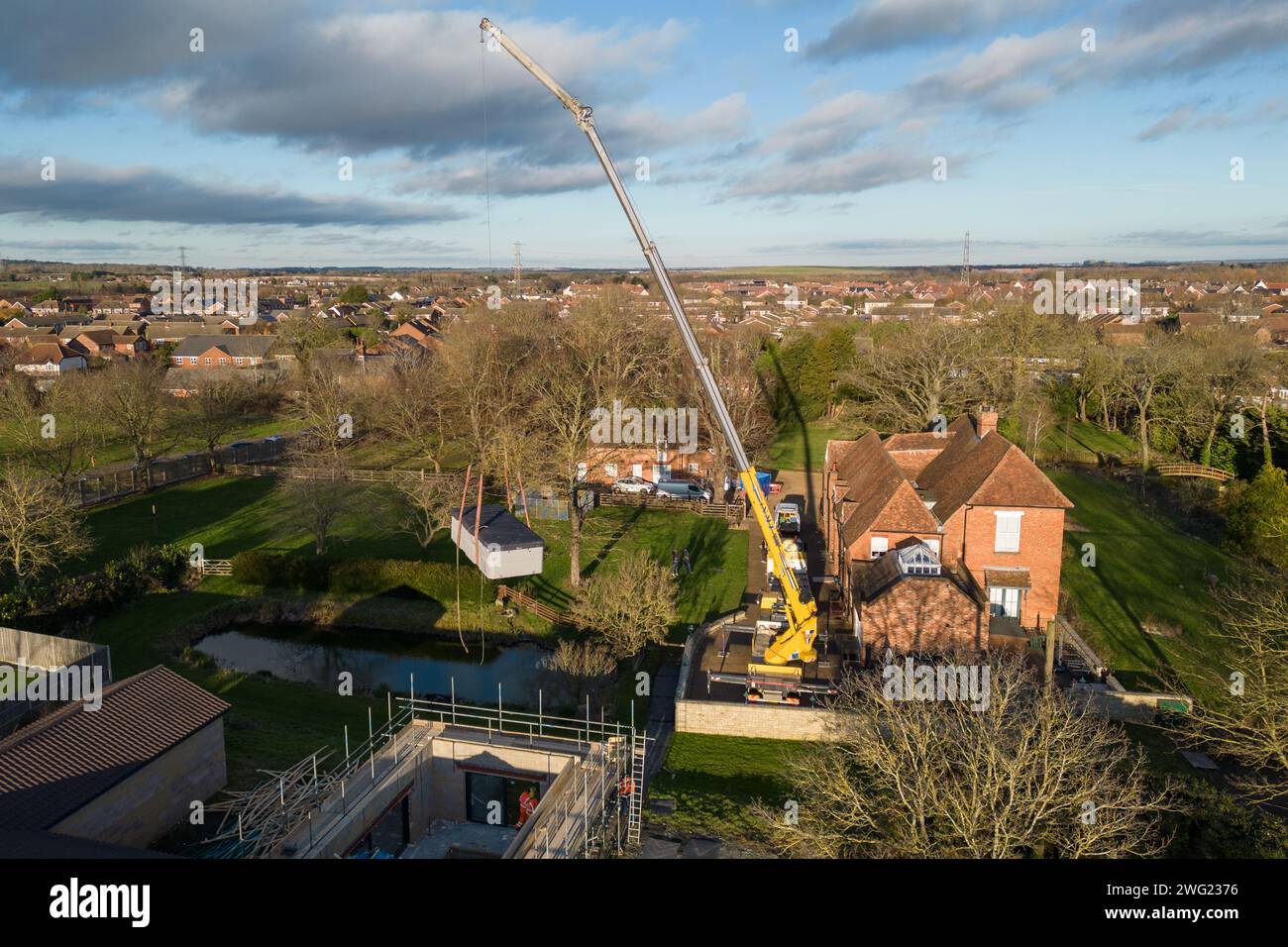 A spa pool is removed from an unauthorised spa pool block at the home ...