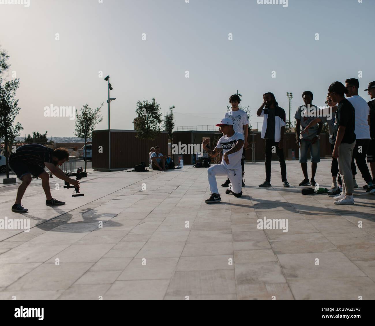 A street dance troop can be seen film a dance video near Tigne Point in ...