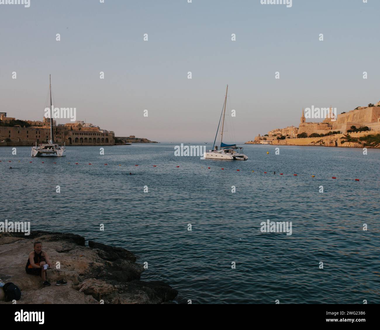 Maltese boats sunset hi-res stock photography and images - Alamy