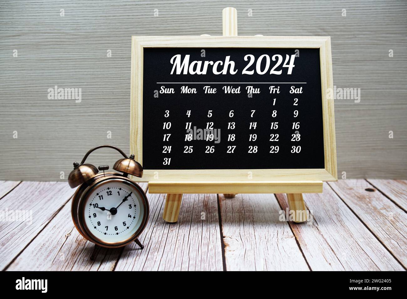 March 2024 monthly calendar on chalkboard for planning and management ...