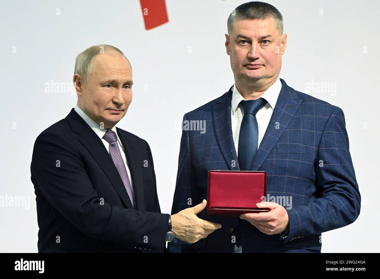 Russian President Vladimir Putin, left, awards General director of the ...