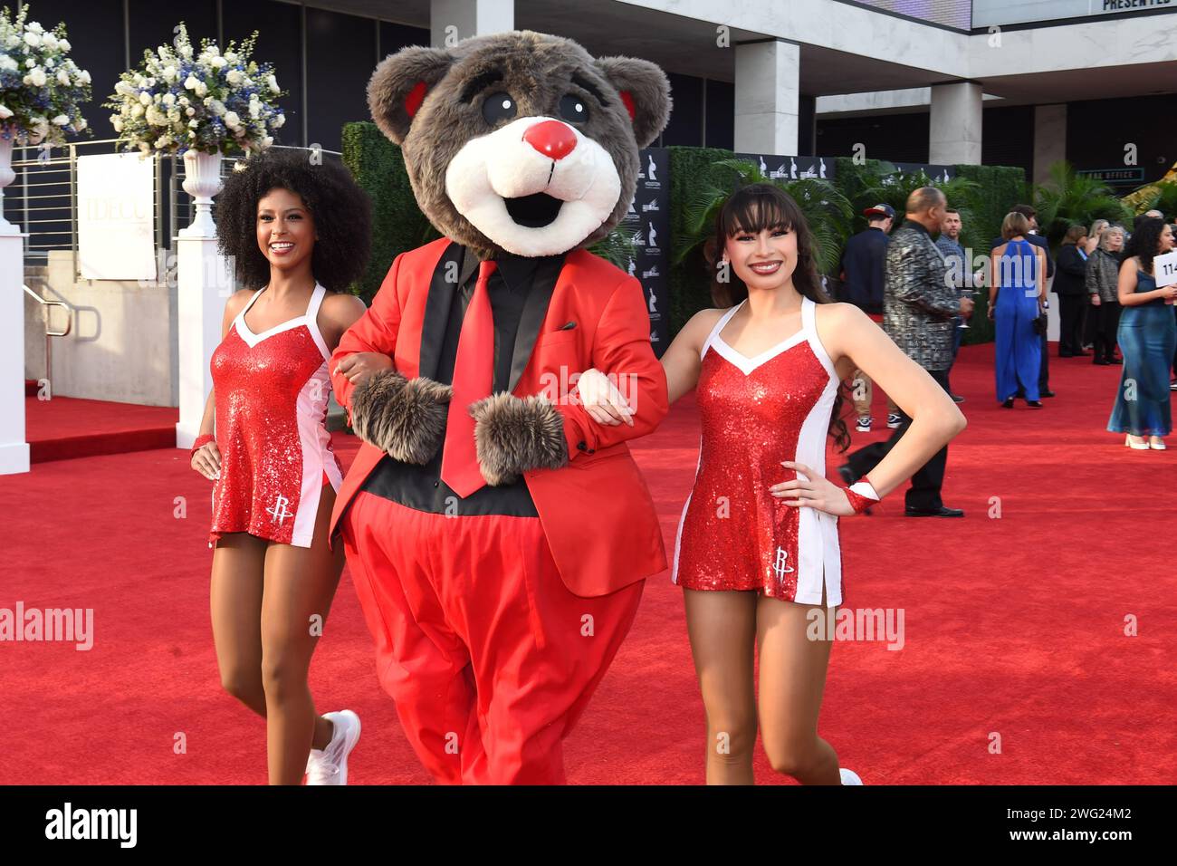 Houston Rockets mascot CLUTCH with 2 of the CLUTCH CITY DANCERS during ...