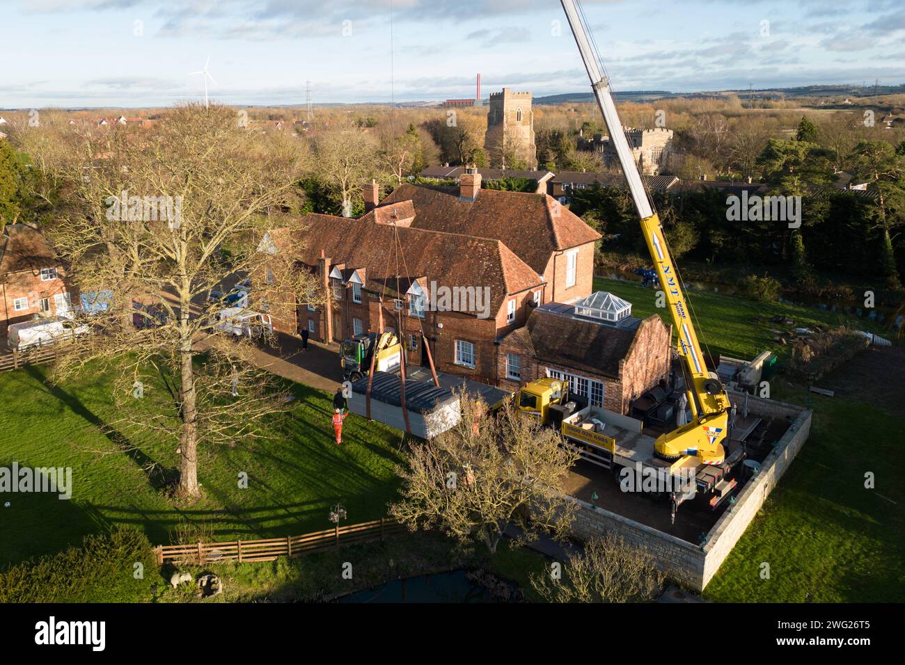 A spa pool is removed from an unauthorised spa pool block at the home ...