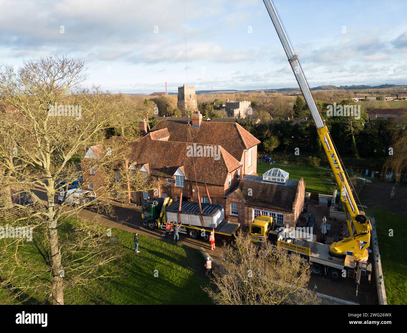 A spa pool is removed from an unauthorised spa pool block at the home ...