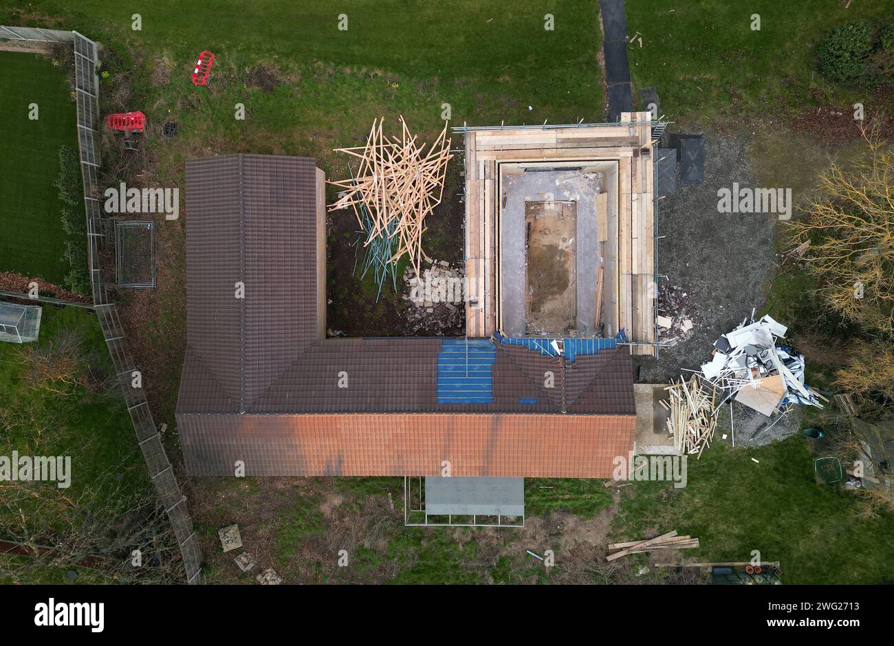 A spa pool is removed from an unauthorised spa pool block at the home ...