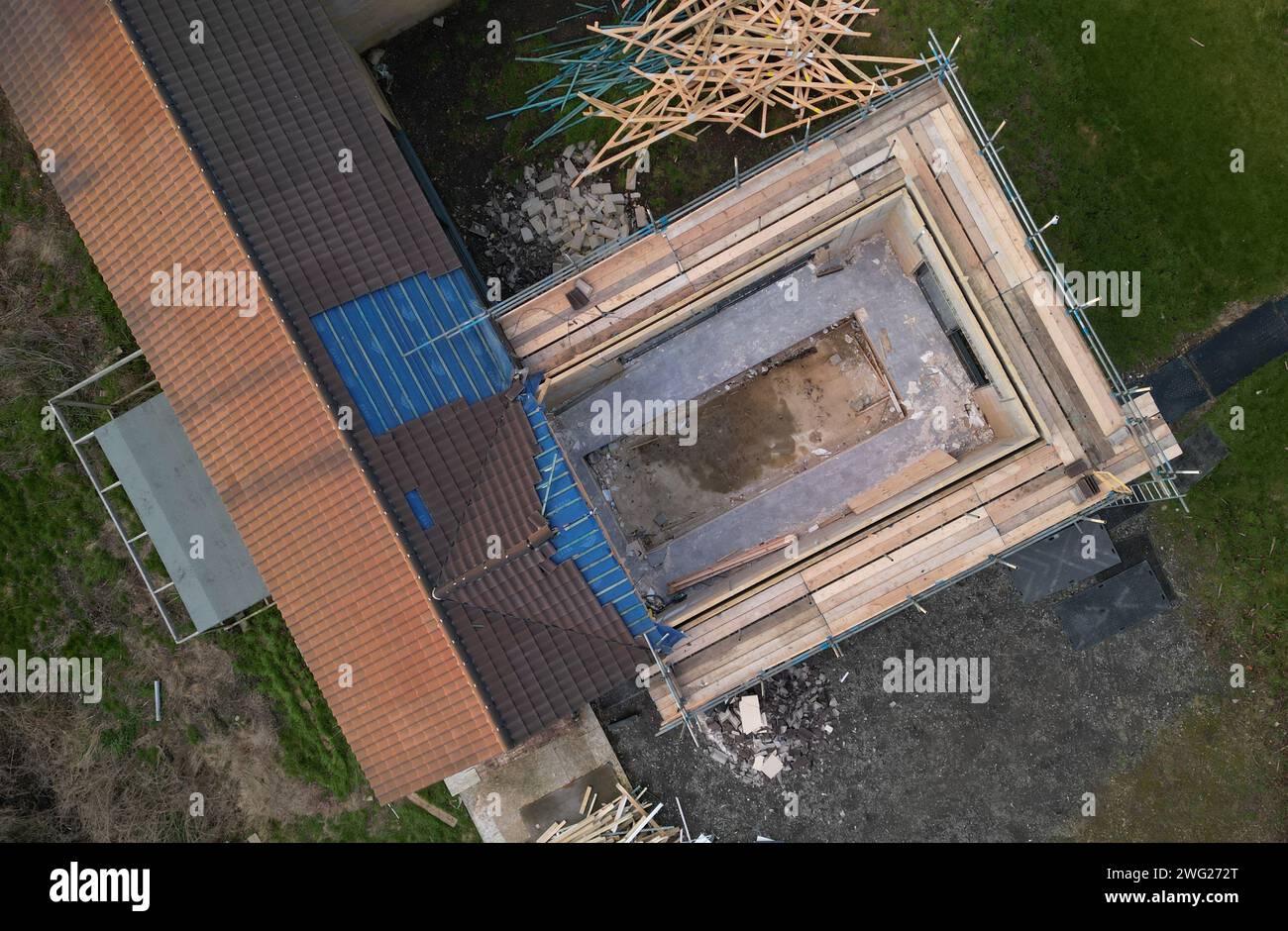 A spa pool is removed from an unauthorised spa pool block at the home ...