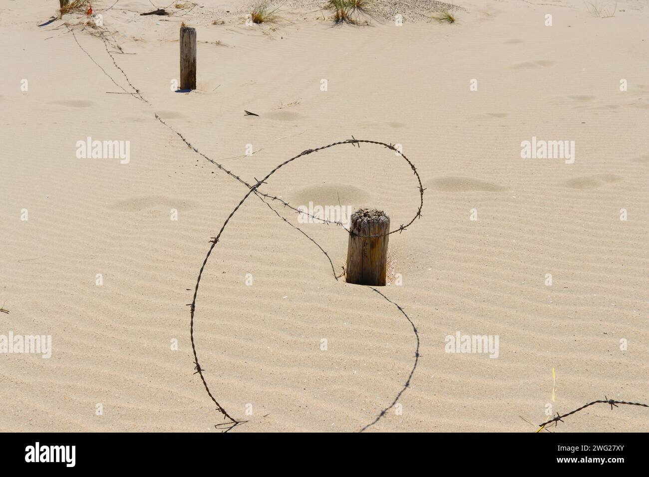 Barbed wire on beach hi-res stock photography and images - Alamy