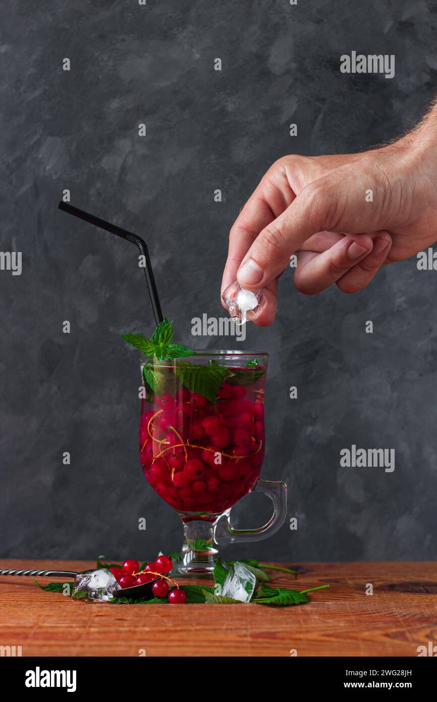 Melting ice cube hand hi-res stock photography and images - Alamy