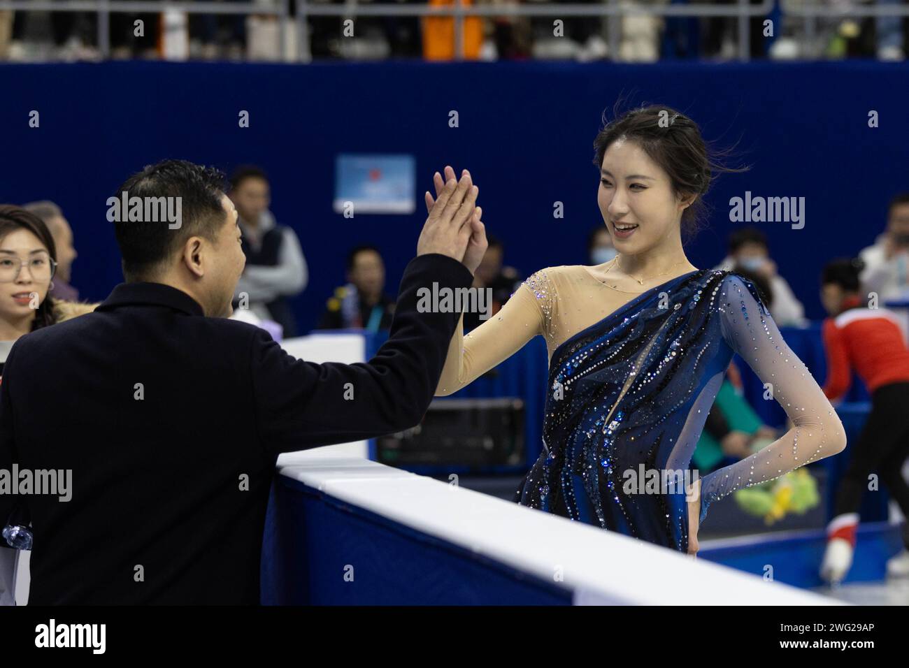 Shanghai, China. 2nd Feb, 2024. China's Chen Hongyi (R) claps hands ...
