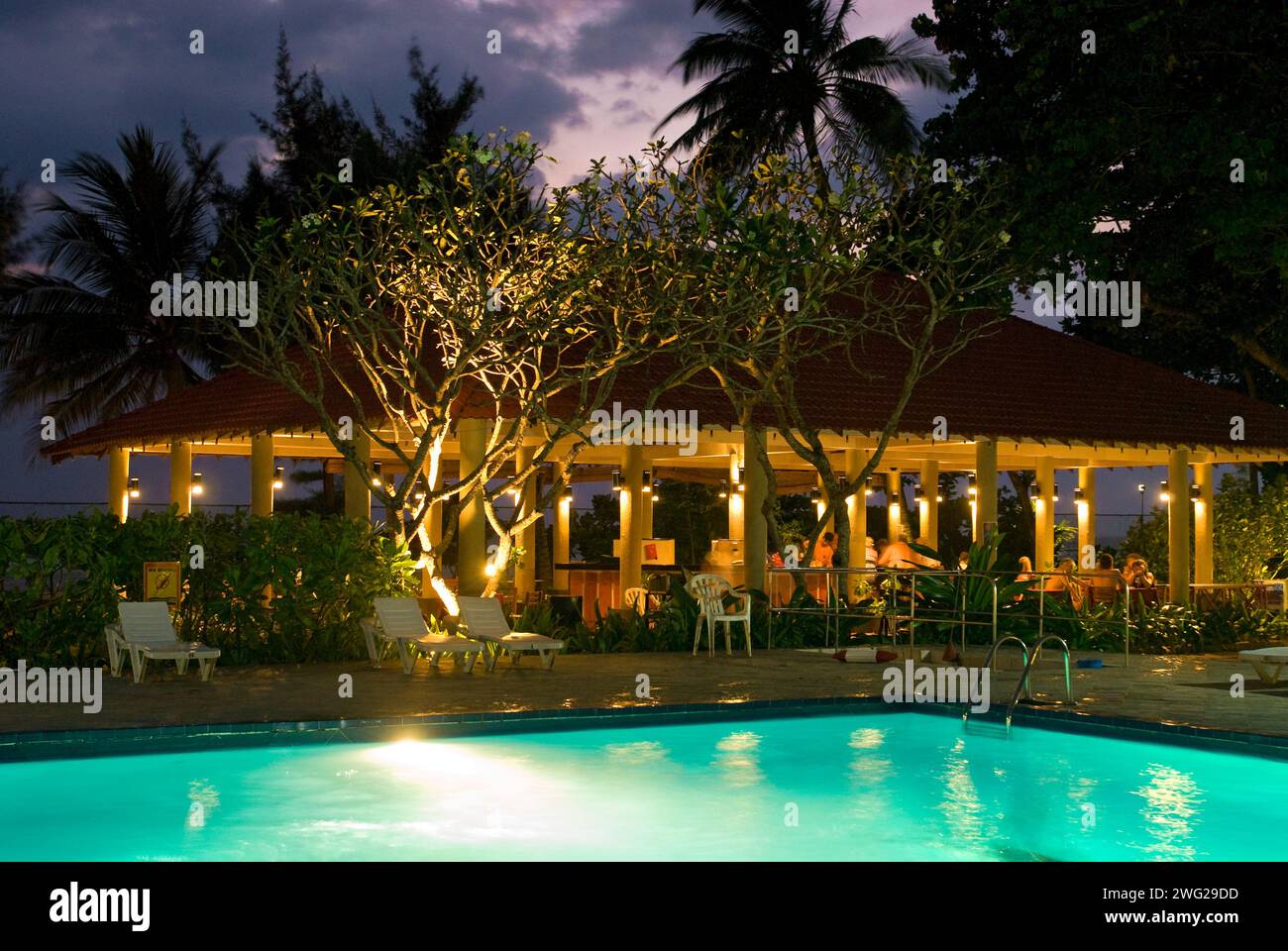 Pool terrace bar at night, Hotel Club Palm Garden, Beruwela, Sri Lanka ...