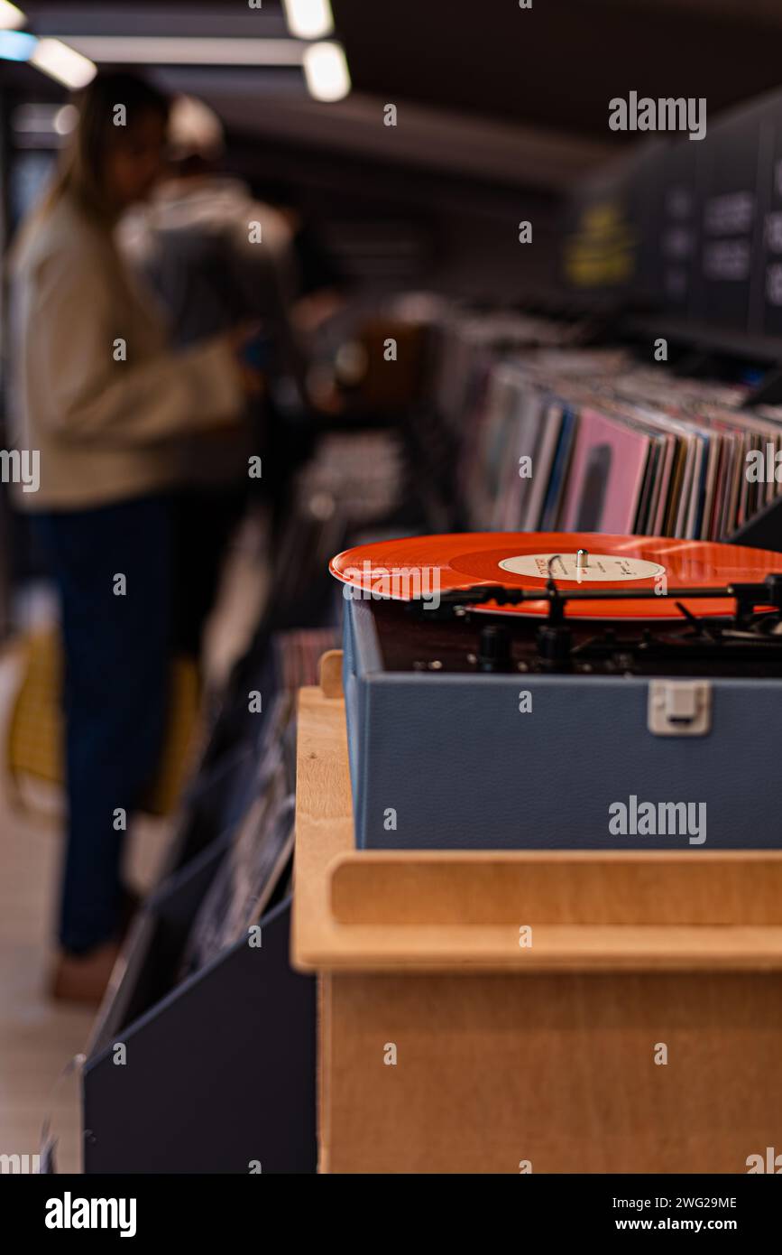 crosley Vintage vinyl record player on the background of a music store ...
