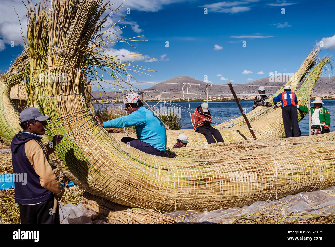 Uros Islands, Peru, May 1st 2009: Craftsmanship at Uros: Building reed ...