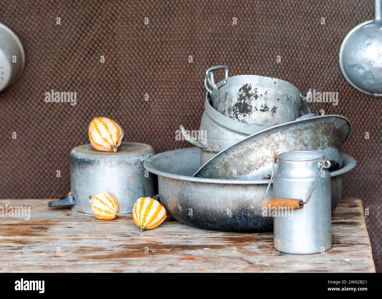 still life with various old aluminum objects, historical dishes ...