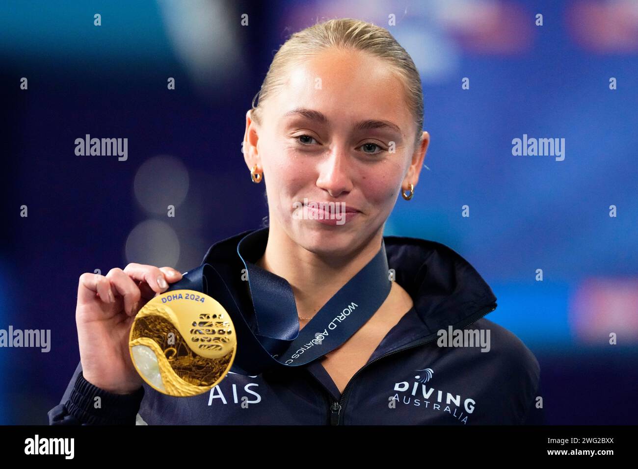 Alysha Koloi of Australia poses with her medal after winning the women ...