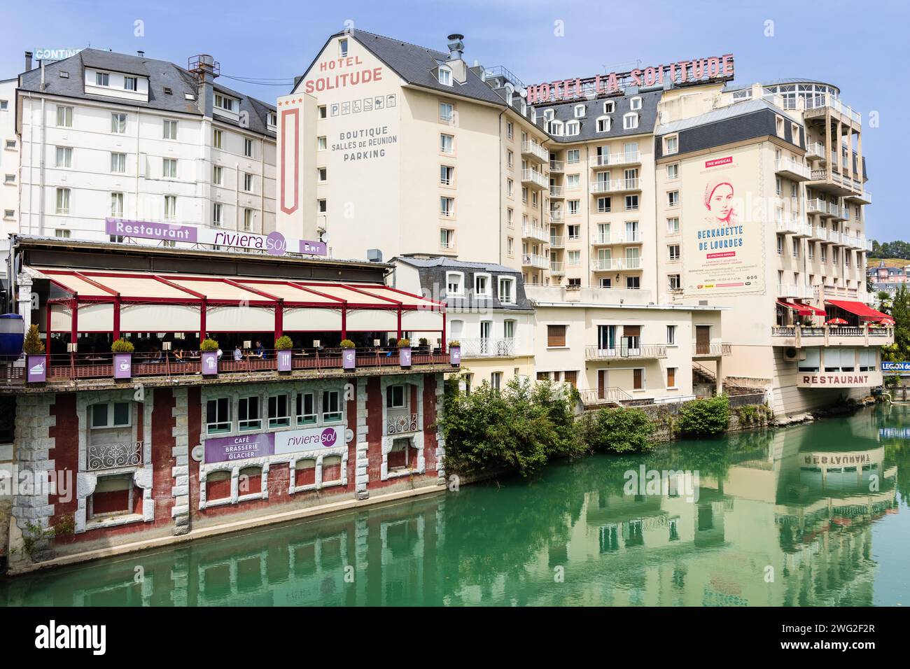 Ousse river, houses, restaurant, and hotels, and their reflection in ...