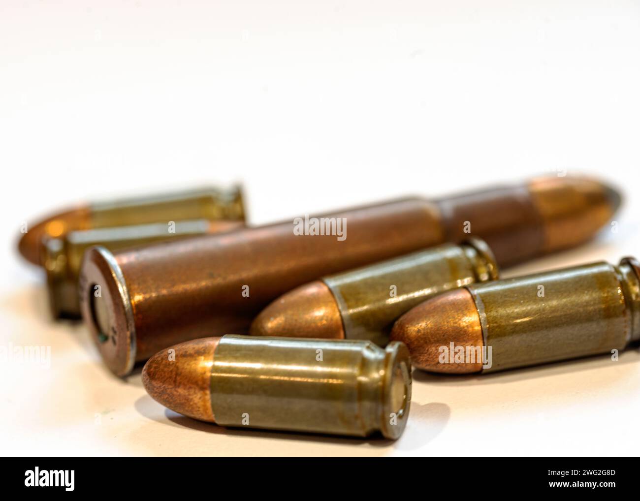 photograph of fired bullets and cartridges, white background Stock ...